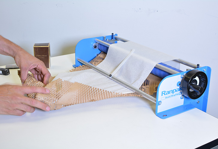 Geami_WrapPakM_Edge_converter_in_use - L.Y. Commercial